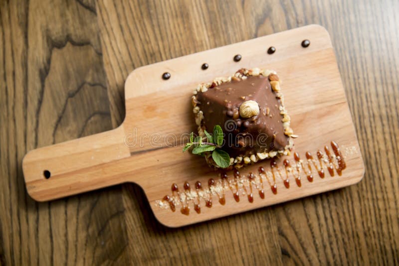 Chocolate Pyramid Shape Cake with Nuts Stock Image - Image of dark ...