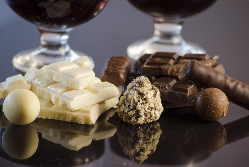 Chocolate in Range on the Black Background Stock Image - Image of still ...