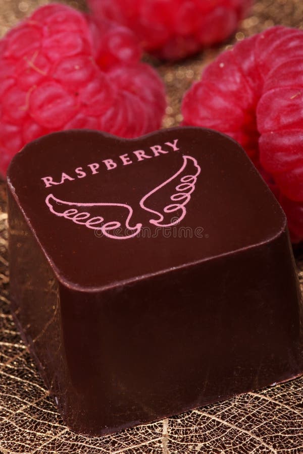 Chocolate with raspberries stock image. Image of assortment - 3997037