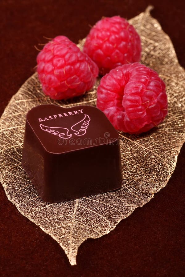 Chocolate with raspberries stock photo. Image of assortment - 4003024