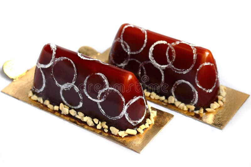 Chocolate Rectangular Cake Decorated with Cream Roses on a Light Table ...