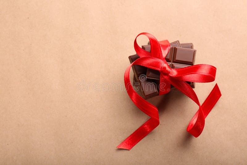 Chocolate with red ribbon stock image. Image of cacao - 65528107