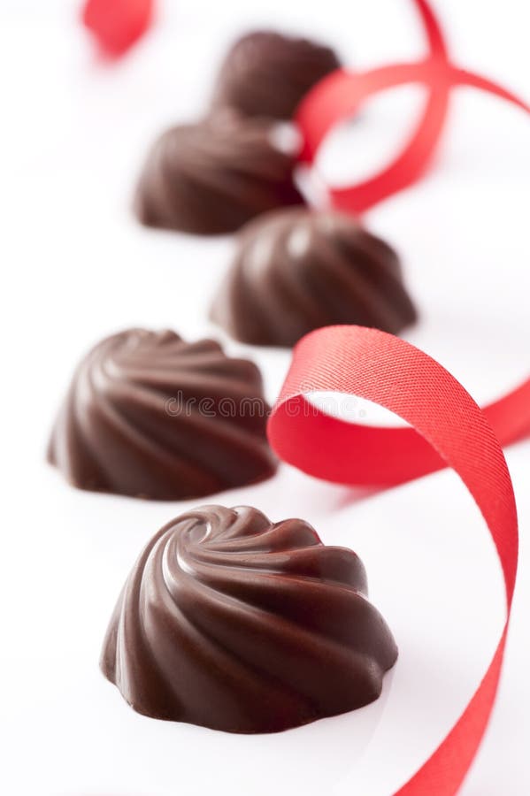 Chocolate and ribbon stock image. Image of dessert, sweet - 27865115