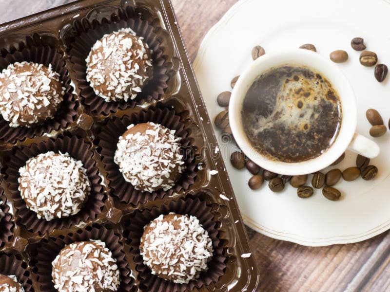 Chocolate Round Cakes with Coconut and a Cup of Coffee Stock Photo ...