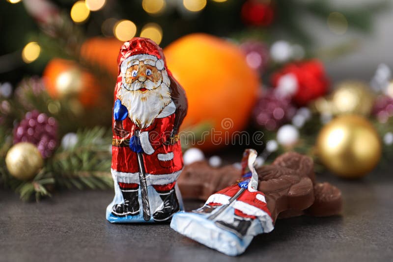 Chocolate Santa Claus Candies on Grey Table Stock Image - Image of ...