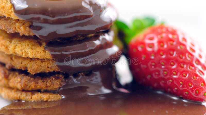 Chocolate Sauce Dripping Over Stack of Cookies. Stock Image - Image of ...