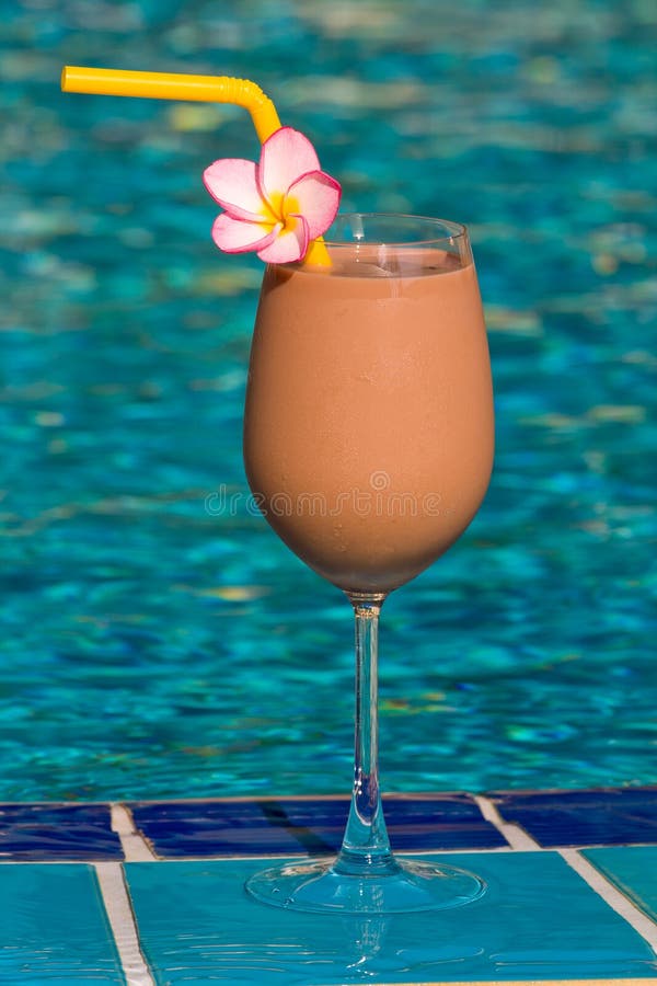 Poolside Pina Colada stock photo. Image of luxury, pool - 14715244
