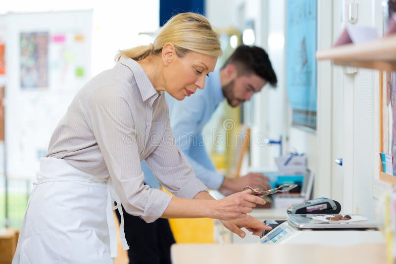 Chocolate Shop Worker Weighing Chocolate Bar Order Stock Image - Image ...