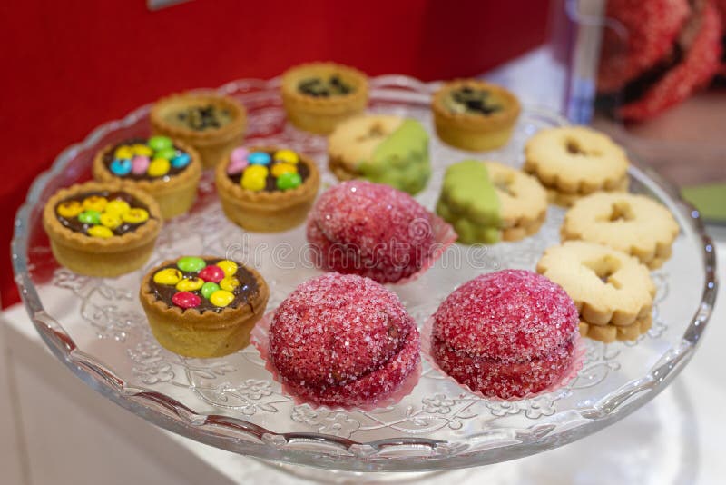Chocolate, Shortbread, Red Sugar-coated Pastries Displayed Above a ...