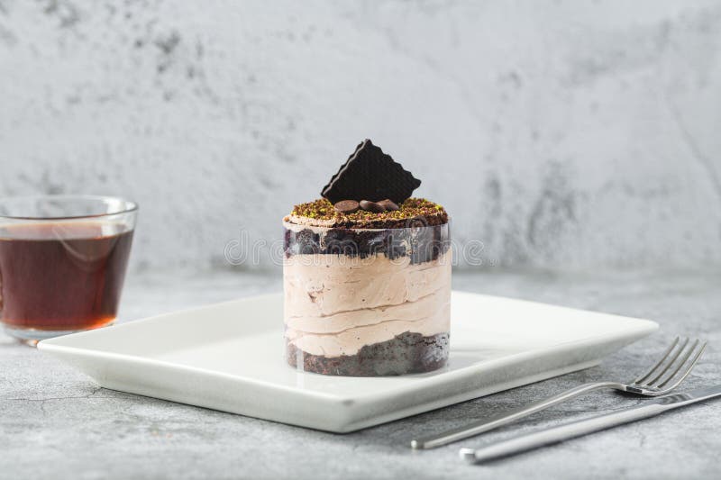 Chocolate Single Mini Cake on a White Porcelain Plate Stock Photo ...