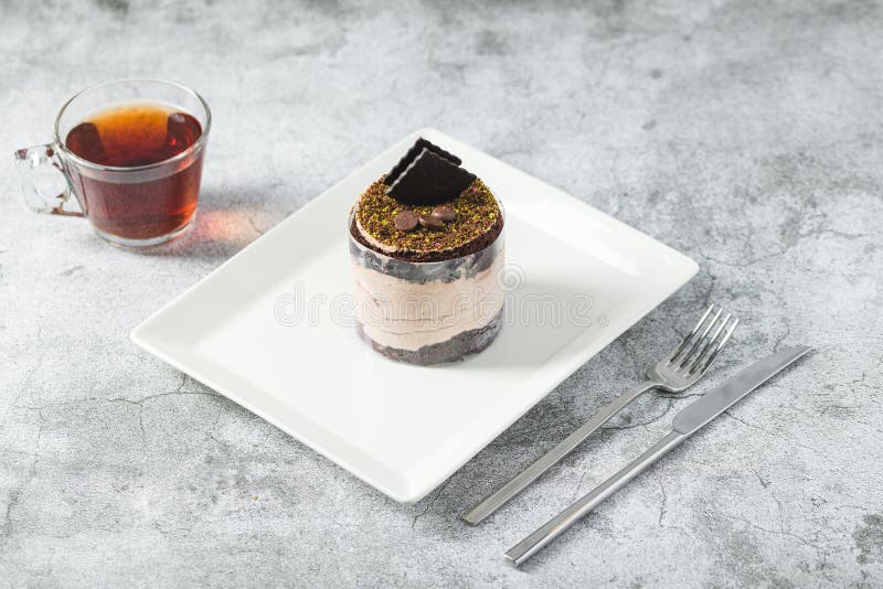 Chocolate Single Mini Cake on a White Porcelain Plate Stock Photo ...