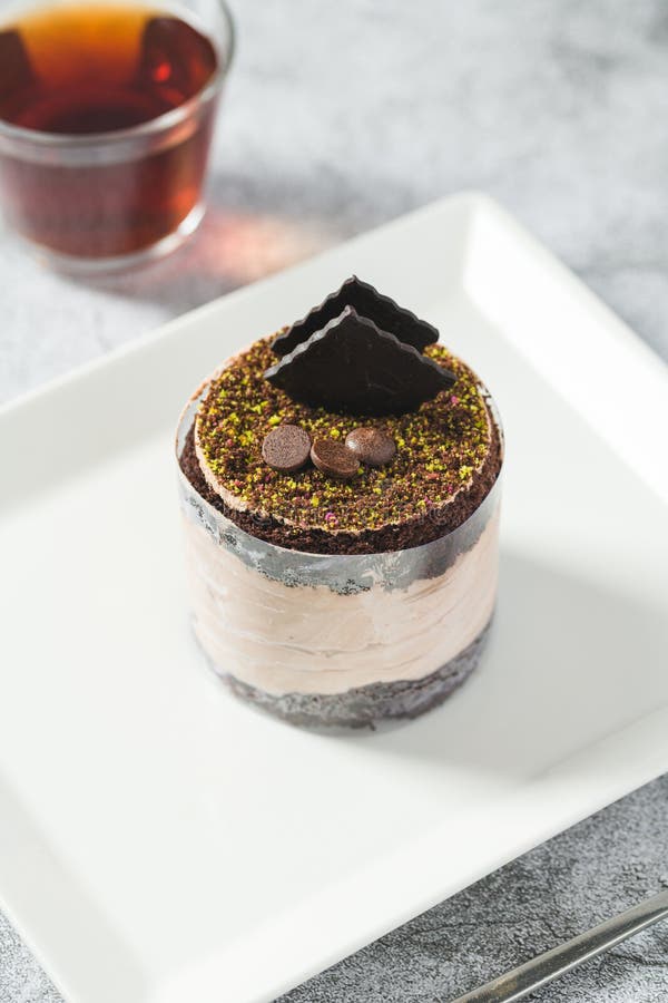 Chocolate Single Mini Cake on a White Porcelain Plate Stock Photo ...