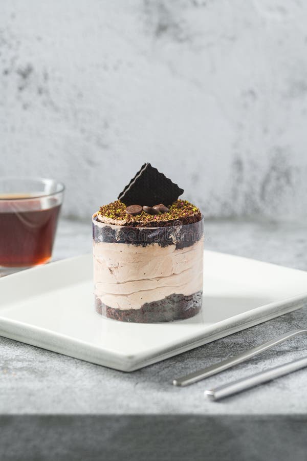 Chocolate Single Mini Cake on a White Porcelain Plate Stock Photo ...