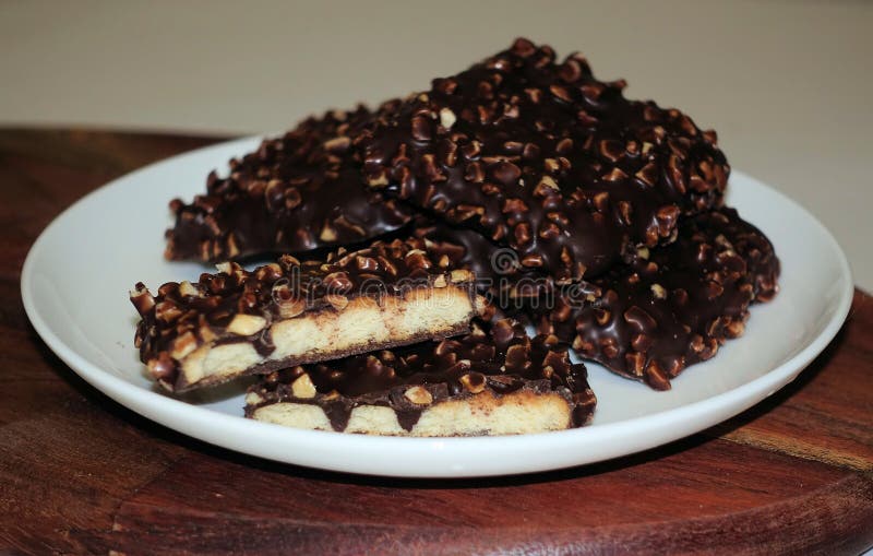 Chocolate Square Biscuits with Nuts on a White Round Plate. Tea Sweets ...