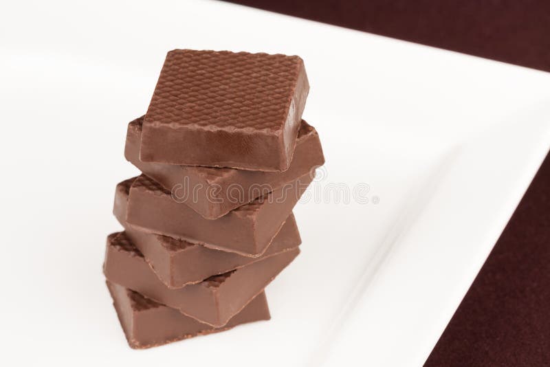Chocolate Squares Stacked stock photo. Image of arranged - 49750942