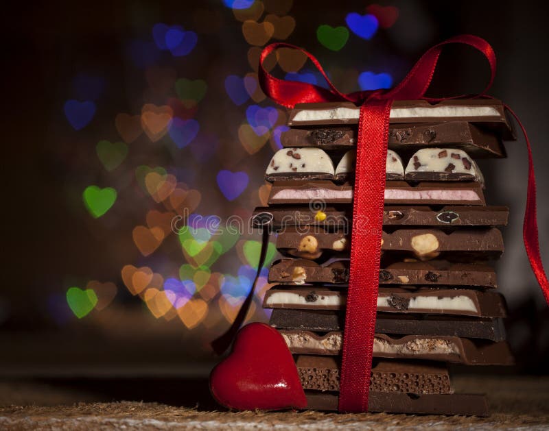 Chocolate Stack on Colorful Bokeh Background Stock Image - Image of ...