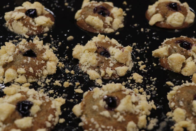 Chocolate Stuffed Baked Muffins or Cupcakes in a Bakery Sheet Stock ...