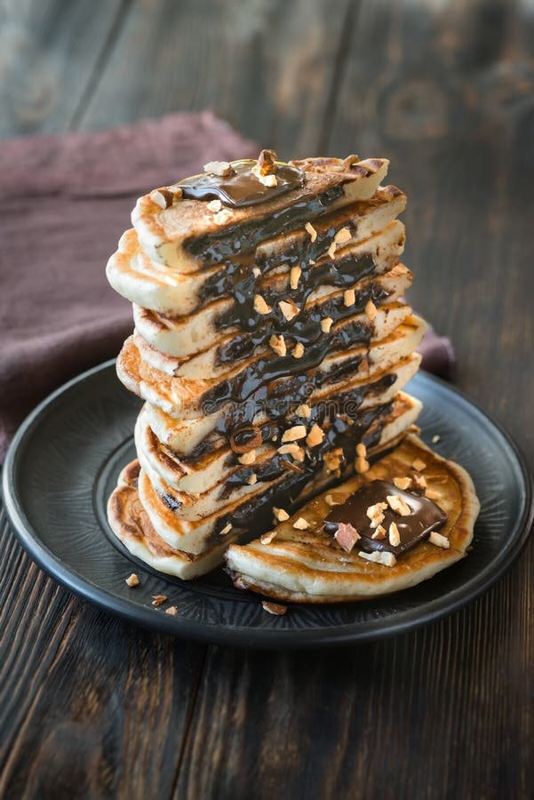 Chocolate stuffed pancakes stock image. Image of pile - 127603607