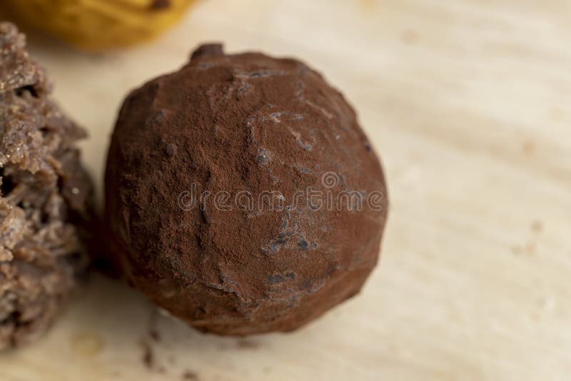 Chocolate Sweet Candy in the Shape of a Ball on the Table Stock Photo ...