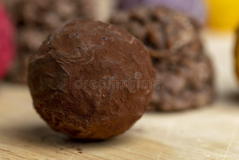 Chocolate Sweet Candy in the Shape of a Ball on the Table Stock Photo ...