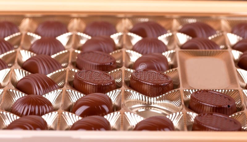 Chocolate Sweets Lie in the Cells of the Boxes Stock Photo - Image of ...