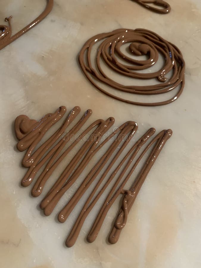 Chocolate Swirl and Pattern on a Marble Table Stock Image - Image of ...