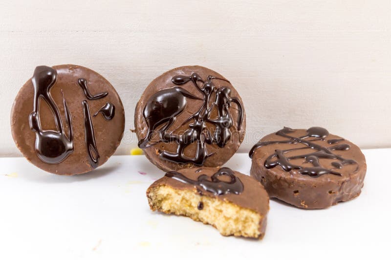 Chocolate syrup cookies stock image. Image of sauce, candy - 69575447
