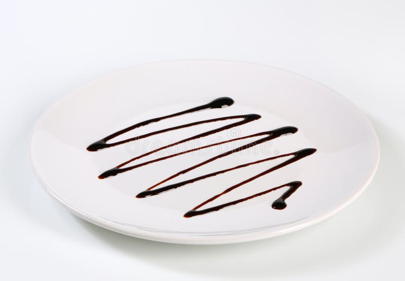 Chocolate syrup drip stock image. Image of white, dessert - 56593013
