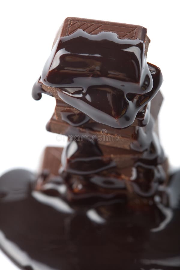 Chocolate Syrup Pouring Onto Chocolate Pieces Stock Photo - Image of ...