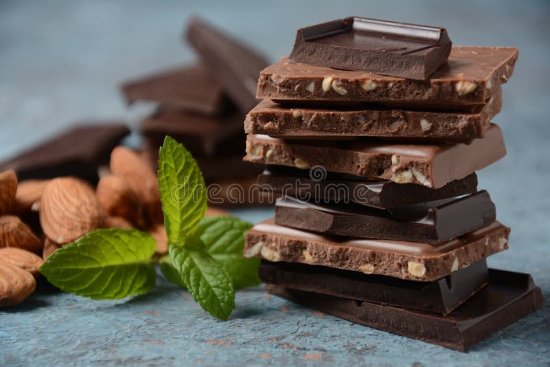 Chocolate Tower. Stack of Chocolate Pieces Stock Image - Image of black ...