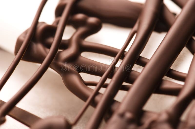Chocolate Traces on a White Paper Stock Image - Image of drop, fall ...