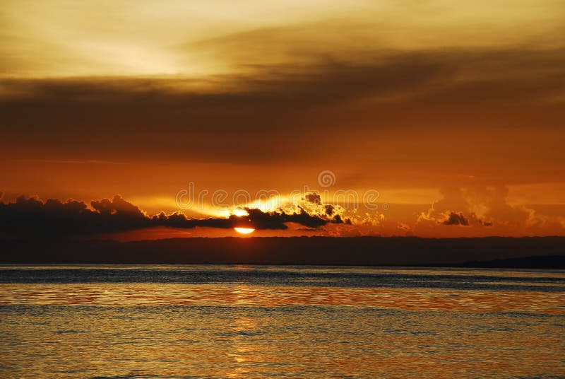 Tropical Sunset with Cross Silhouette Stock Photo - Image of memorial ...