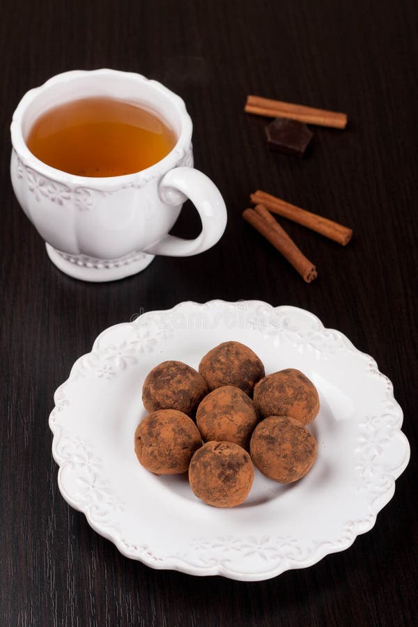 Chocolate truffles and tea stock image. Image of aromatic - 60799125