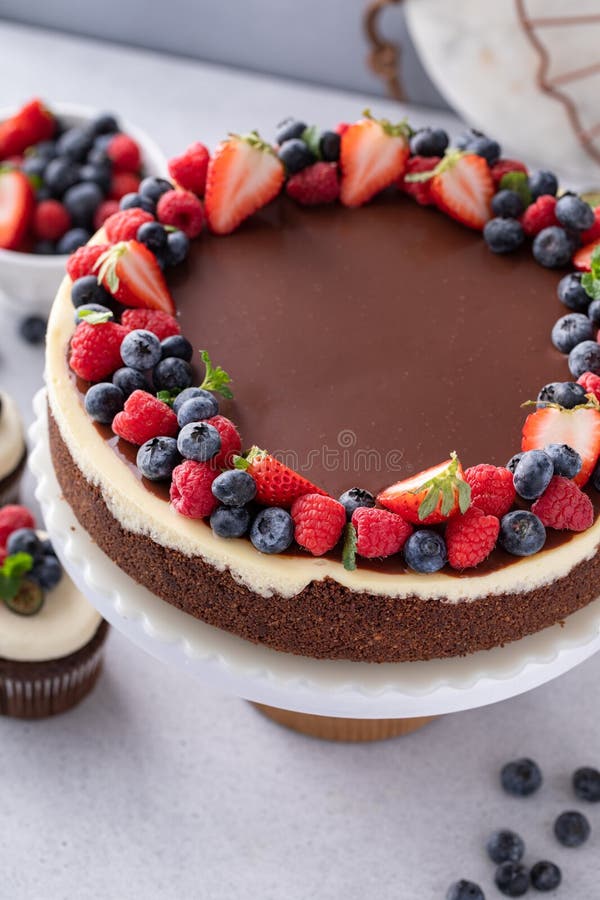 Chocolate and Vanilla Cheesecake with Summer Berries Stock Photo ...