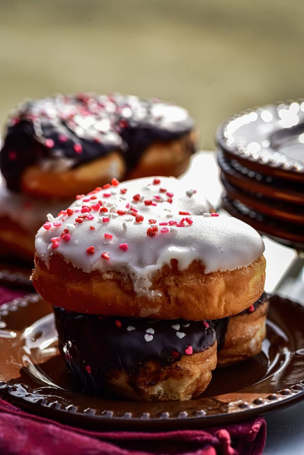 Chocolate and Vanilla Heart Shaped Donuts Stacked Stock Image - Image of mountain, detail: 211405805