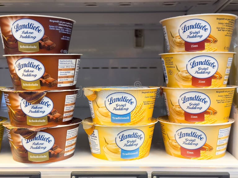 Chocolate and Vanilla Pudding Cups on Store Shelf with Assorted Flavors ...