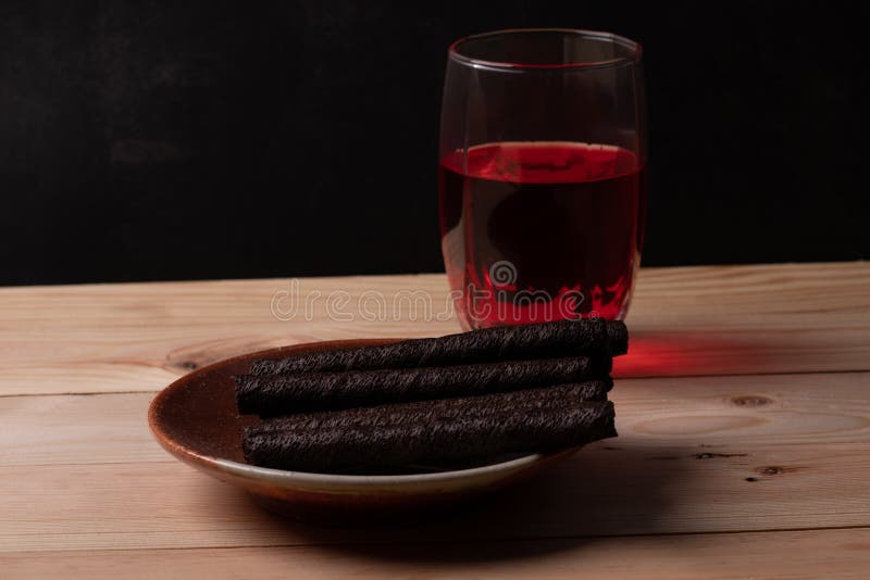 Chocolate Wafer with Red Water. Dark Tone Stock Photo - Image of sundae ...