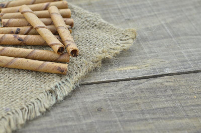 Chocolate Waffle Roll Sticks in Burlap Stock Photo - Image of chocolate ...