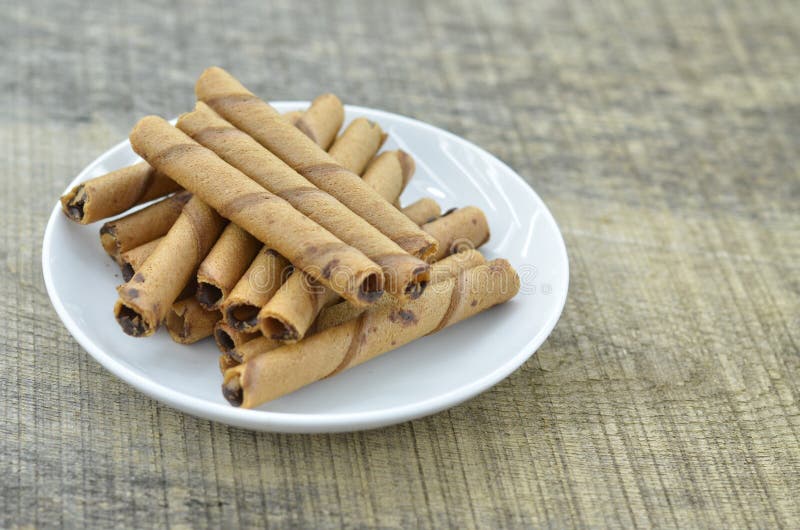 Chocolate Waffle Roll in White Plate Stock Photo - Image of calorie ...
