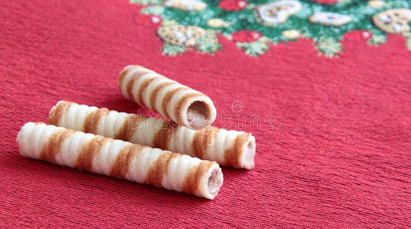 Chocolate Waffle Rolls on Christmas Mat. Stock Photo - Image of ...