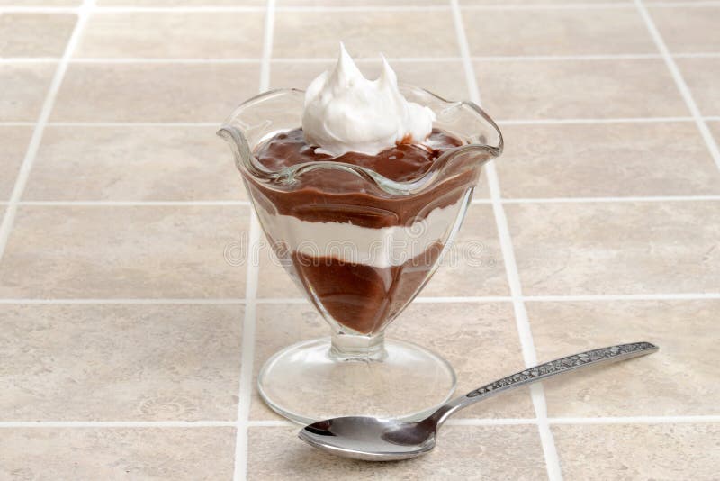 Chocolate and Whipped Cream Pudding with a Spoon Stock Photo - Image of ...