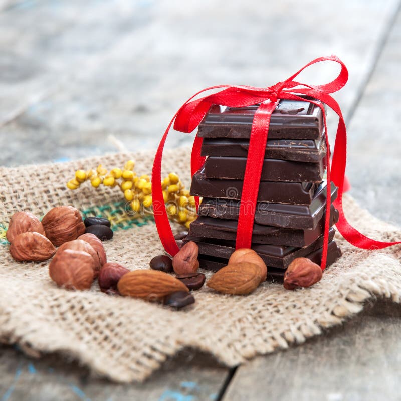 Chocolate on wooden table stock image. Image of food - 36220653