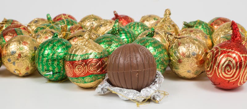 Chocolate Wrapped in Gold Foils Stock Image - Image of elegant, brown ...