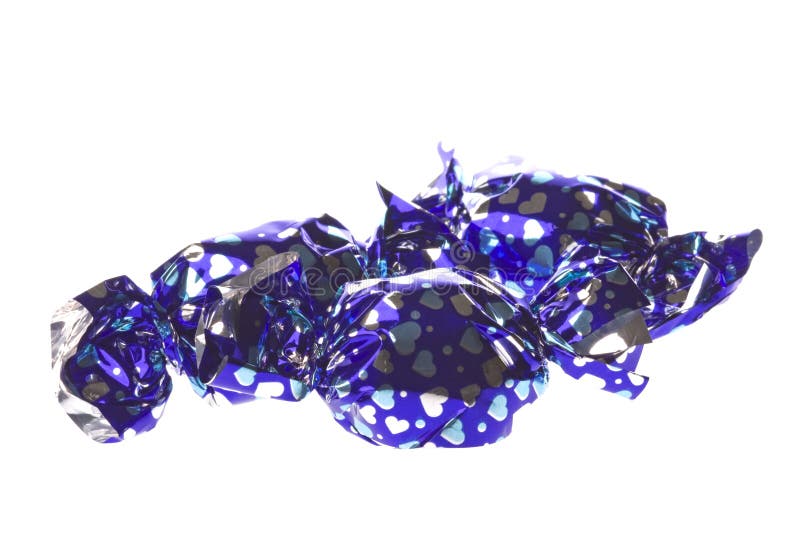 Chocolate in Wrapper Isolated Stock Photo - Image of wrappers, sweet ...