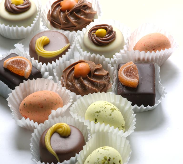 Chocolates stock photo. Image of light, hand, candy, fruit - 118228