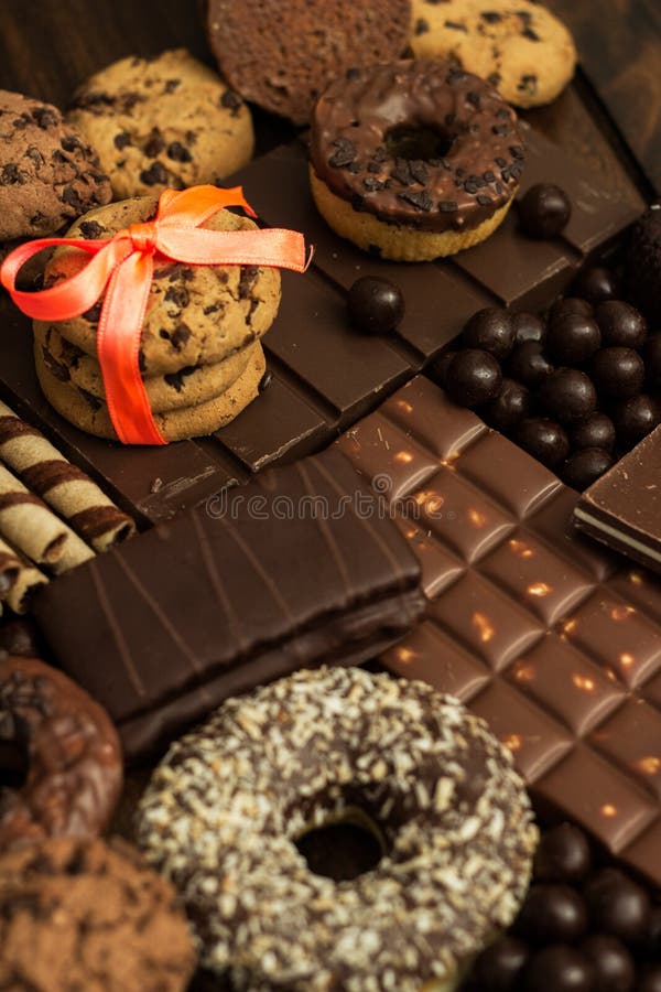Chocolates and Biscuits Assortment Background Stock Photo - Image of ...