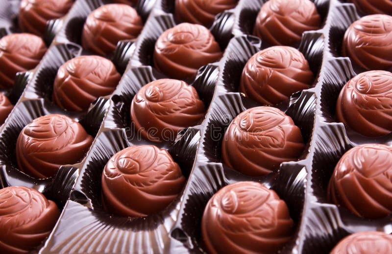Chocolates in box stock photo. Image of tasteful, tasty - 11988478