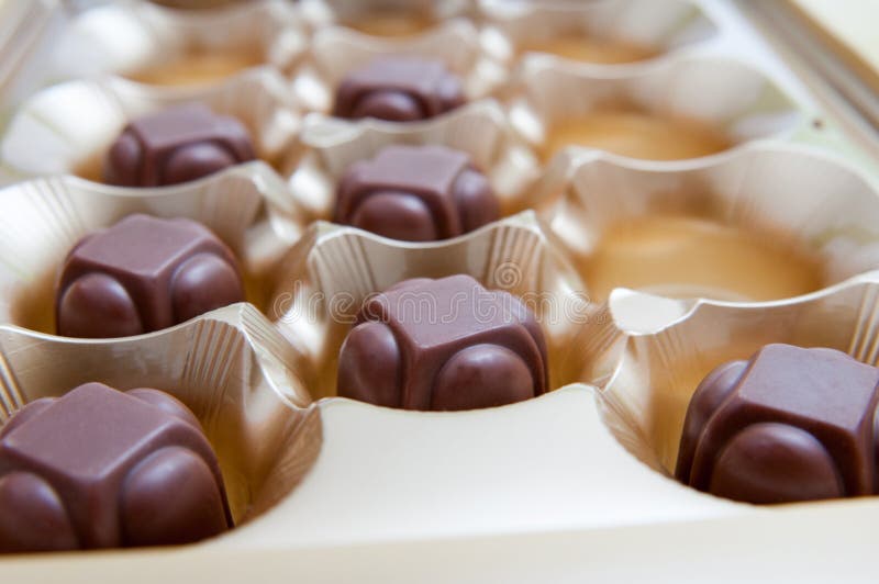 Chocolates in a box stock photo. Image of stacked, stack - 60620492