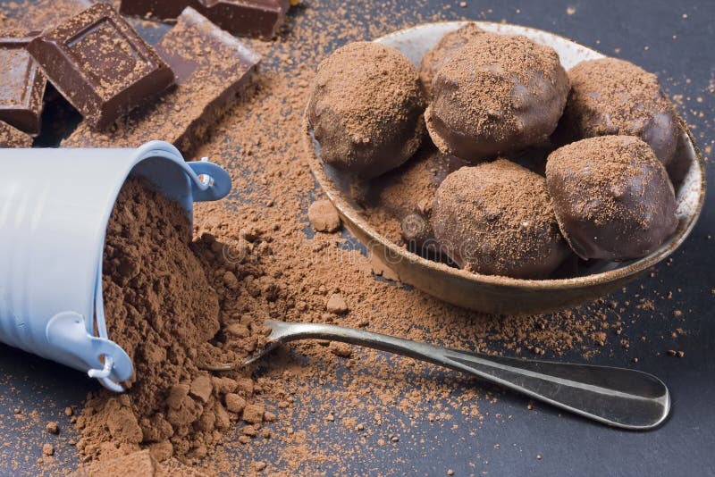 Chocolates, Cocoa Powder and Pieces of Chocolate Stock Photo - Image of ...