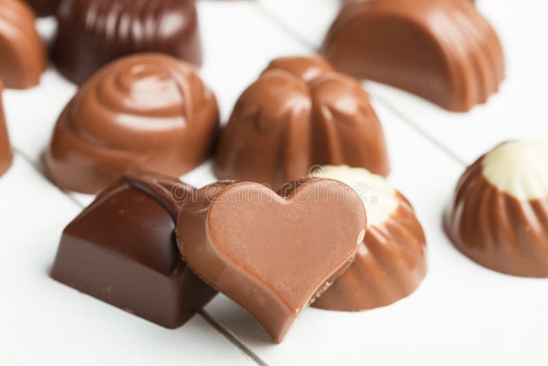 Chocolates Com Formas Diferentes Foto de Stock - Imagem de diferente ...